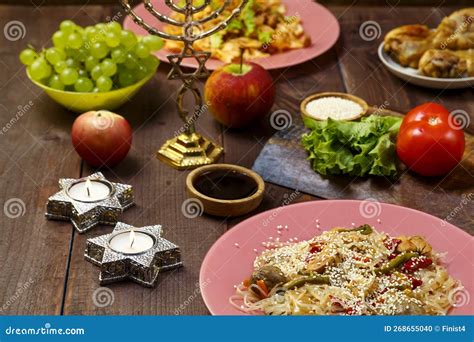Shabbat Set Table With Traditional Food Fruits Burning Candles And