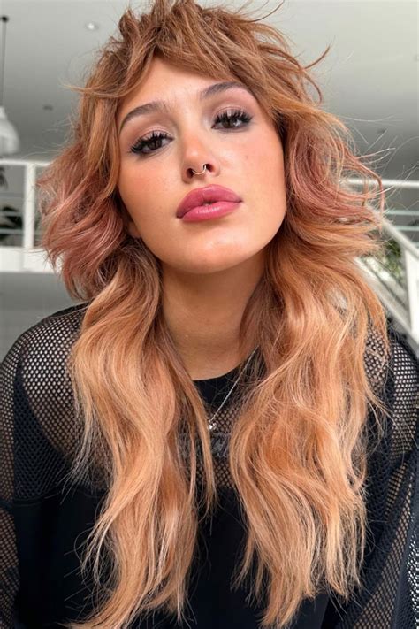 Edgy Shag With Choppy Layers With Micro Bangs Retro Inspired Long Haircut