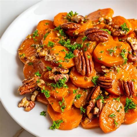 Tender Carrots Glazed With Maple Syrup And Pecans