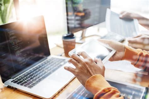 Development Programmer Writing A Code On Database Teamwork Cooperation