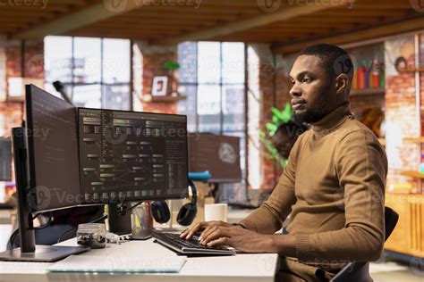 It Engineer Using Pc In Innovative Startup Office And Programming