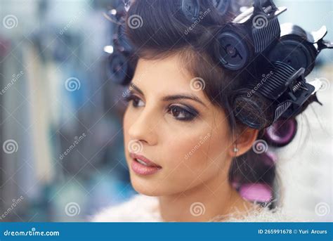 Creating The Perfect Curls A Young Model At The Hair Salon With