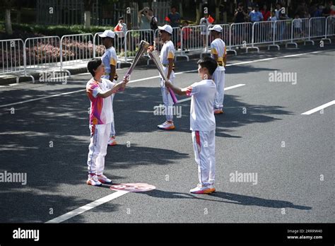 Huzhou Chinas Zhejiang Province 9th Sep 2023 Torch Bearers Qian Zhiquan R And Zhang Shan