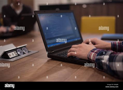 Software Developer Writing Programming Code On Laptop Computer Stock Photo Alamy