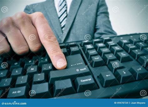 Businessman Pressing The Intro Key Of A Computer Keyboard Stock Photo Image Of Business Data