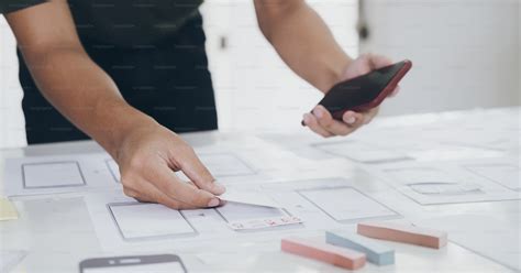 programmer and ux ui designer working in a software development and