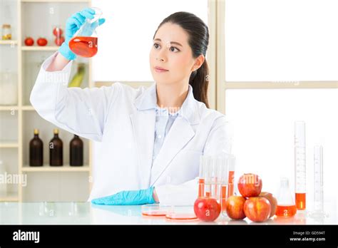 female scientist looking for new genetic modification in laboratory