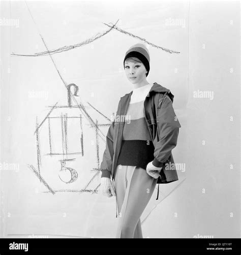 In The 1960s A Fashion Model In Typical 1960s Winter Clothes In A