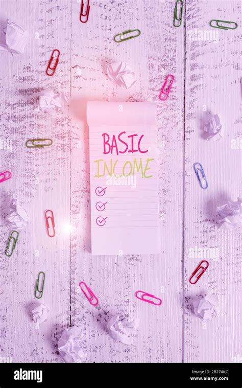 Conceptual Hand Writing Showing Basic Income Concept Meaning Periodic