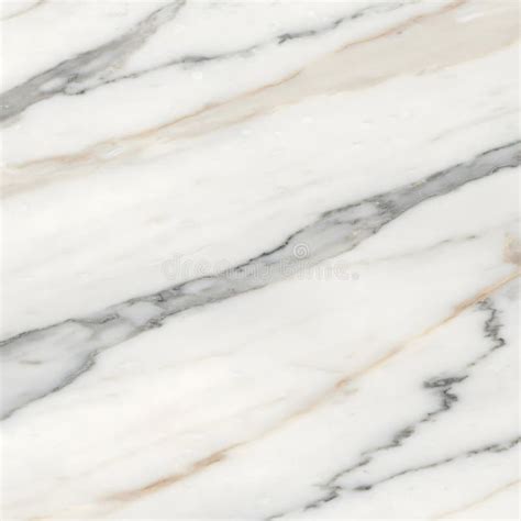 A Smooth White Surface Features Flowing Gray And Light Brown Veining