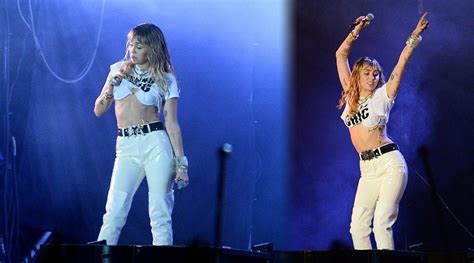 Miley Cyrus Sexy On Stage Exposing White Bra Hot Celebs Home