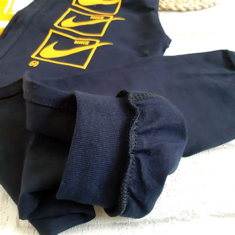 فروشگاه اینترنتی لباس بچه گانه نی نی پوش هودی شلوار کادر Nike