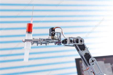 Robotic Arm Holding Syringe Stock Image F0131119 Science Photo