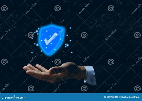 Businessman Holding A Shield Icon With A Lock Mark Computer Data