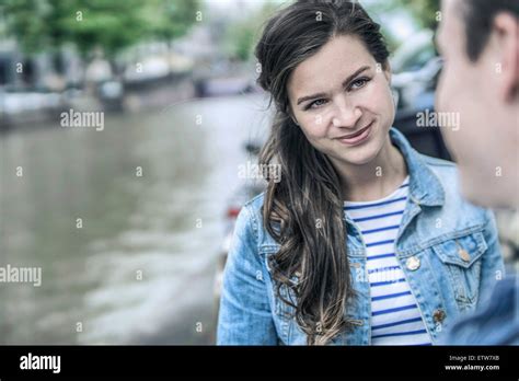 Netherlands Amsterdam Portrait Of Smiling Woman Face To Face With A