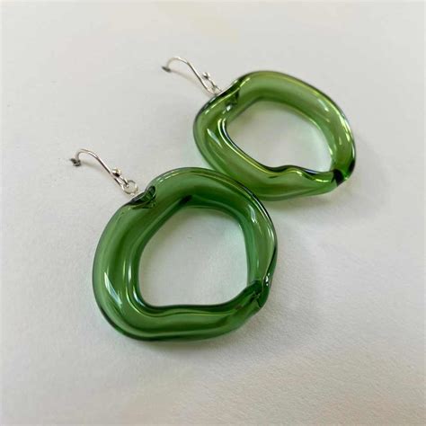 Hollow Loop Earrings Wearing Glass
