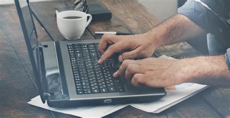 Male Hands Typing Text On The Laptop Keyboard Stock Image Image Of