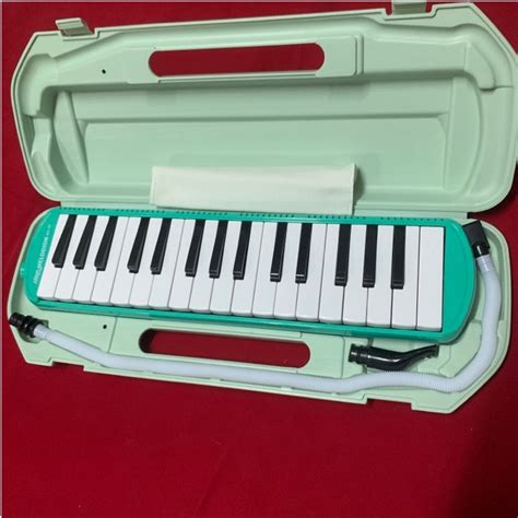 เมโลเดียน Melodian ขนาด 32 คีย์มาตรฐาน เมโลเดี้ยน พร้อมสายเป่าและปากเป่าในกล่องเคสแข็งแรง