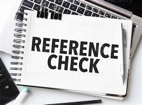 Reference Checks On Notebook With Laptop And Calculator 20451880 Stock