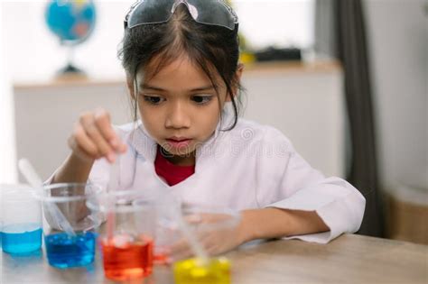 Asian Girl Doing Chemical Experiments At The Lab Stock Photo Image Of Class Science 312329760