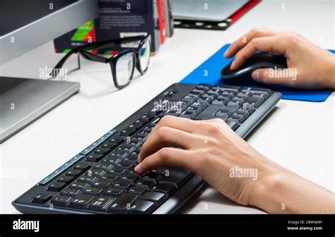Two Hands Typing On Keyboard Stock Photo Alamy