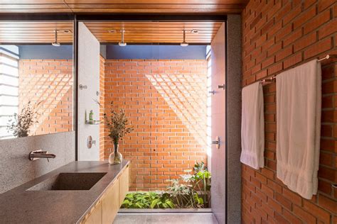 Concrete Ribs Cradle Brickwork Walls At Bloco Arquitetos Brasília