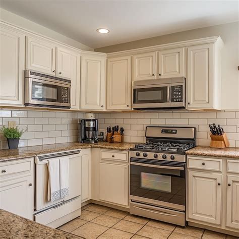 Diyer Updating Kitchen Cabinets With Fresh Paint Premium Ai Generated