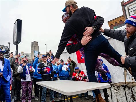 Why Do Bills Fans Jump Through Tables Examining Buffalos Viral Home