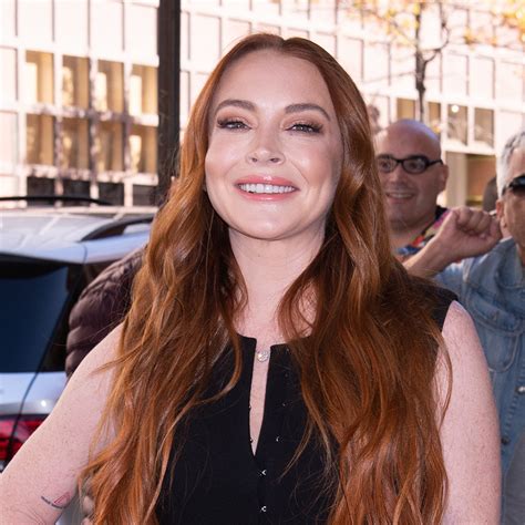 Lindsay Lohan Steps Back Into The Spotlight In A Sheer Beaded Dress On The Red Carpetshe Looks