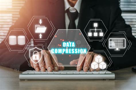 Person Hand Typing Keyboard Computer On Desk With Data Compression Icon On Virtual Screen Stock