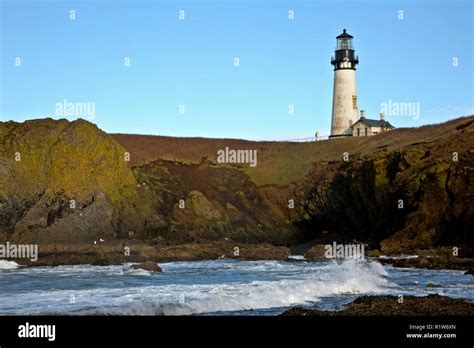 Or02390 00 Oregon Yaquina Head Lighthouse From Cobble Beach In The
