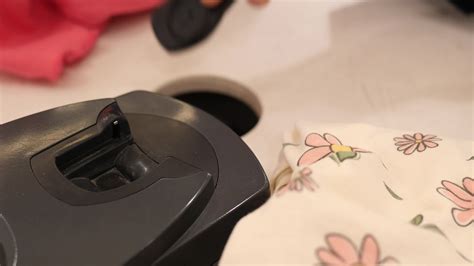 Removing Clothing Security Tag On A Shirt Stock Video At Vecteezy