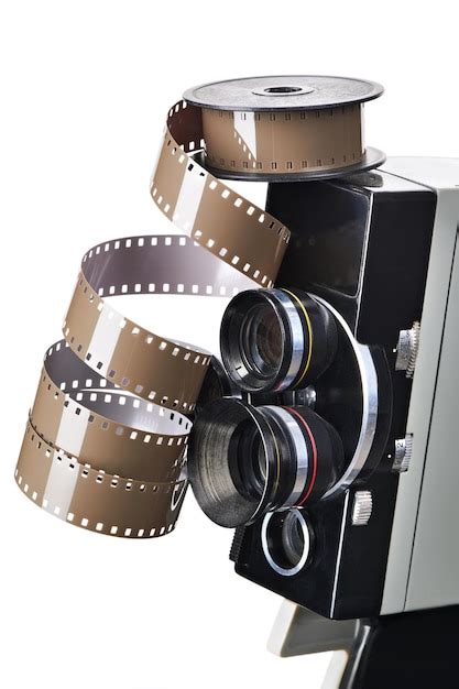 레트로 기계 영화 카메라와 릴 필름 절연 프리미엄 사진