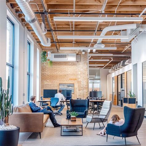 Modern Office Space With Employees Collaborating On A Project Teamwork