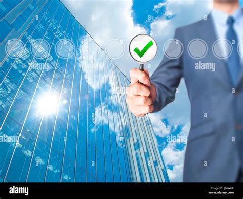 Businessman Magnifying Glass Check Mark On Virtual Screen Magnifying Glass On A Checklist Box