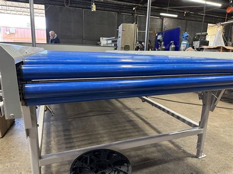 Ee003 Custom Roller Inspection Conveyor Ee003 Roller Sorting Conveyor System Exeter Engineering