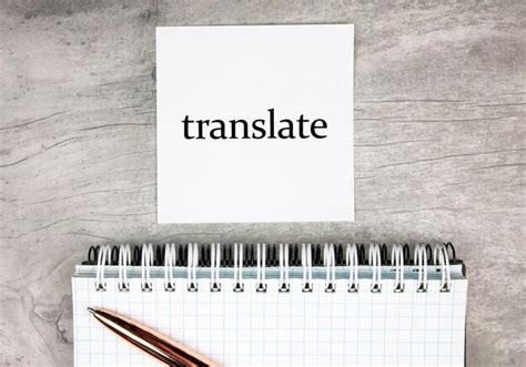 Premium Photo Translate Acronym Text On A Notepad With A Pen Translate Text Concept