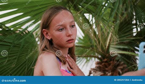 Blogger Blonde Teen Girl Makes Selfie On Smartphone Under Palm Tree On