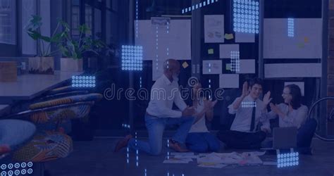 Data Processing Image Over Diverse Team Collaborating On Floor In Modern Office Stock Image