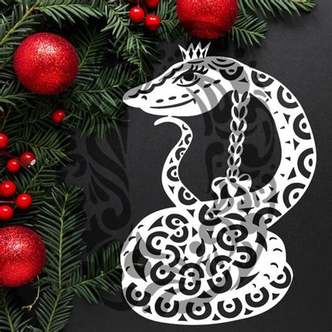 Вытынанки на год Змеи 2025 шаблоны вырезалки на окна New Years