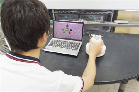 figure 2 from desktop versions of the string based haptic interface