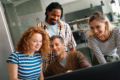 Programmers Working In A Software Developing Company Office Stock Image