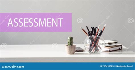 Assessment â€“ Text On The Background Of The Office Table Business