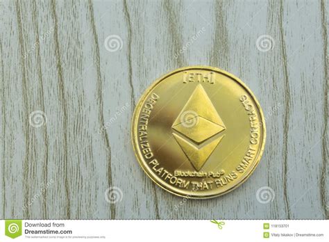 Stack Of Ether Coins Or Ethereum On Gold Background To Illustrate