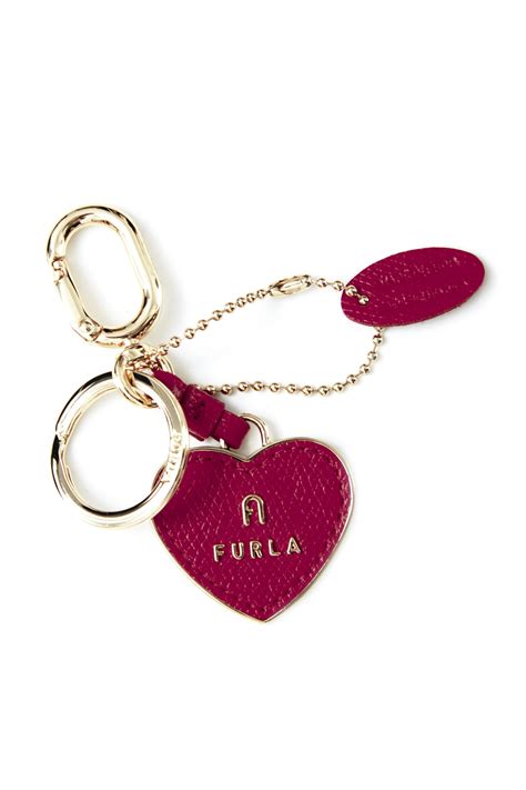 Furla женский брелок для ключей camelia бордовый цвет, размер UN, цена ...