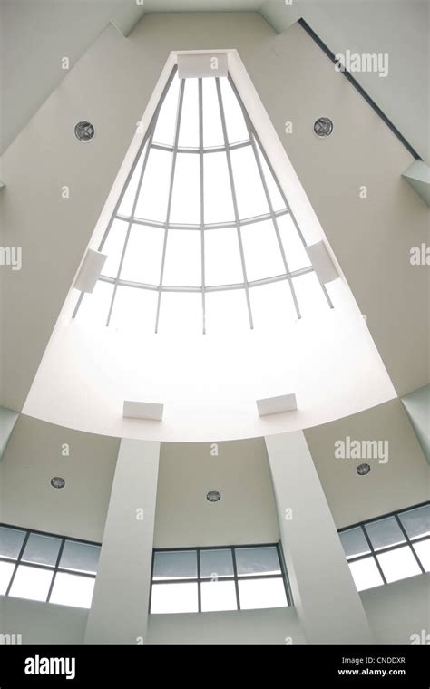 A Modern Architectural Interior With A Triangular Shaped Skylight Stock