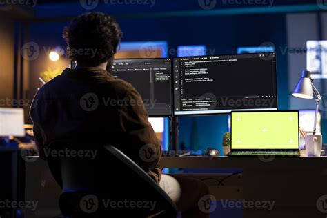 Programmer Designing And Developing Software Applications Using Isolated Screen Laptop It
