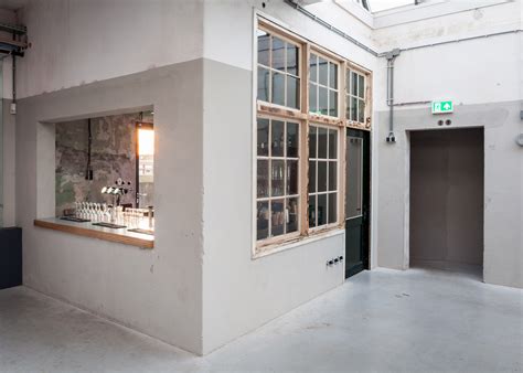 Wenink Holtkamp Architecten Converts Grain Silo Into Food Market