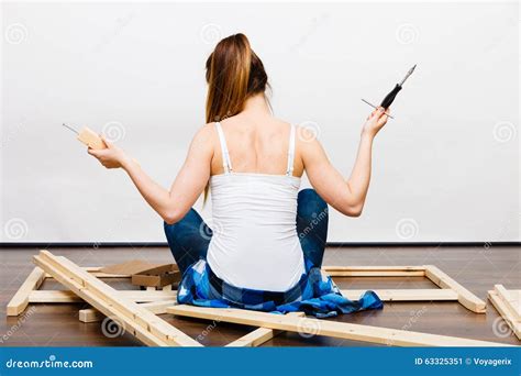 Woman Assembling Wooden Furniture Diy Rear View Stock Image Image