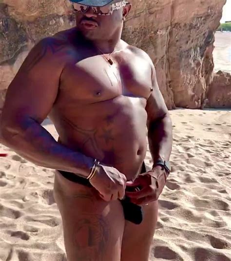 Black Muscle Posing His Black Thong At The Beach